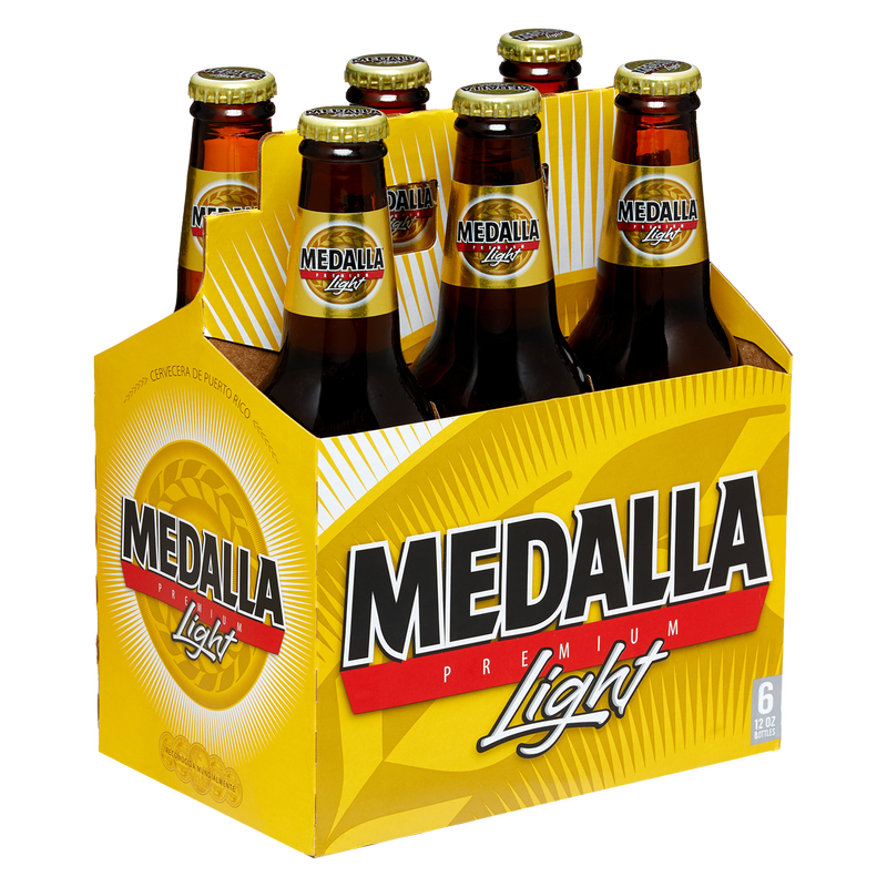 Medalla Light 6pk 12oz Btl 4.0% ABV : Alcohol fast delivery by App or ...
